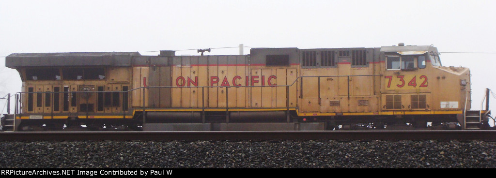 UP 7432 and her sister in the middle of consist.. tied up in Eugene yard.